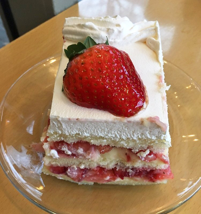 Layer upon layer of delicate cake, strawberries, and cream &ndash; this cassata slice isn't just dessert, it's architecture you can eat.