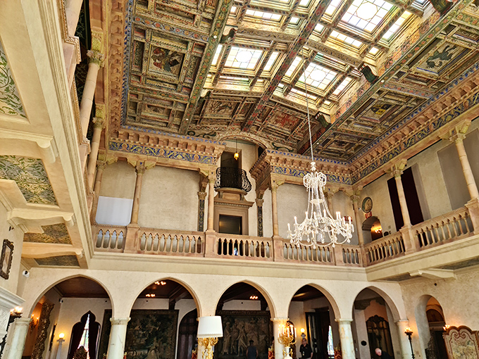 The Great Hall's ceiling looks like what would happen if Michelangelo and a Venetian craftsman collaborated after a few glasses of prosecco.