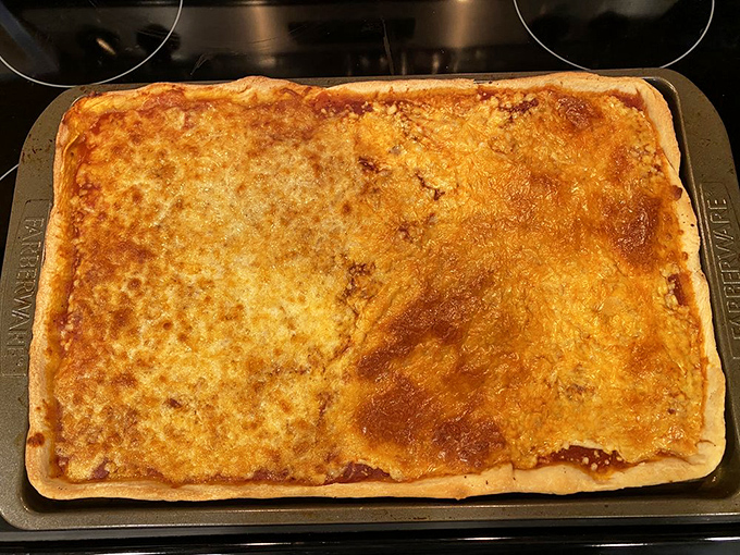 The plain cheese pizza at Maroni's achieves that golden-brown perfection that makes you wonder why anyone bothered inventing pizza toppings in the first place.