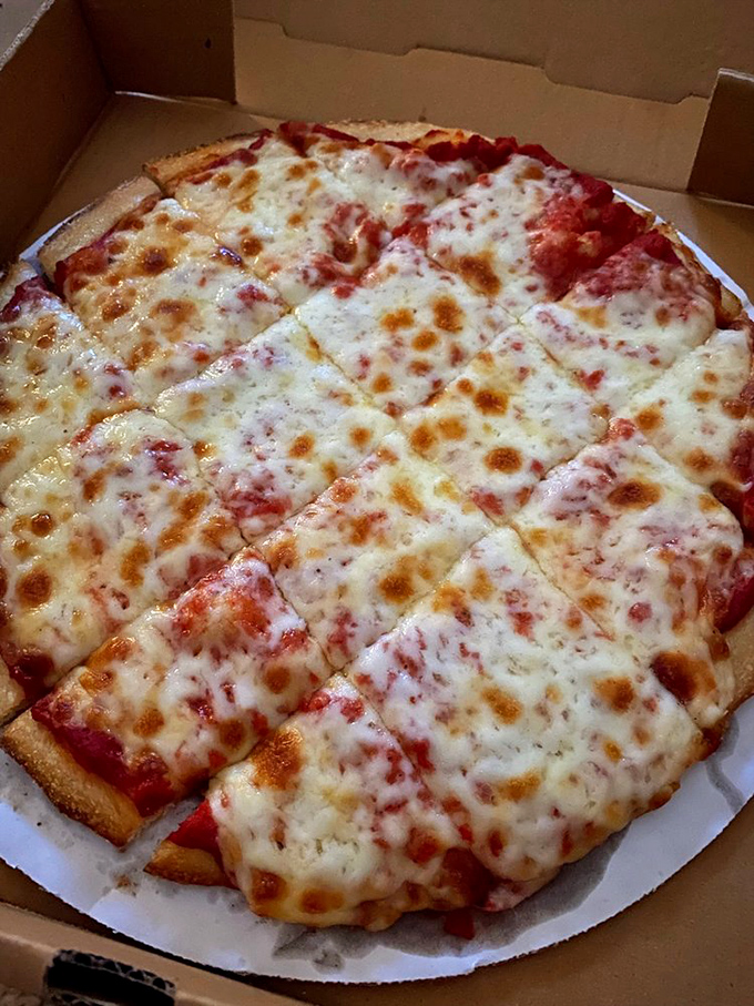 Cheese pizza perfection that proves simplicity is the ultimate sophistication. Sometimes the classics are classics for a reason.