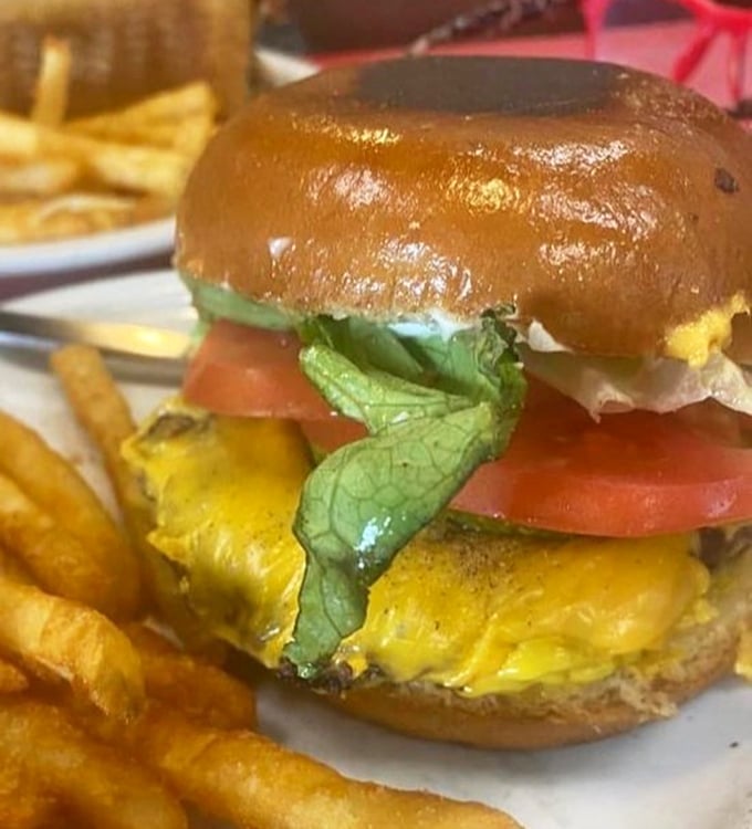 Behold the cheeseburger in its natural habitat&mdash;perfectly melted cheese cascading down a hand-patted patty like a yellow waterfall of deliciousness.