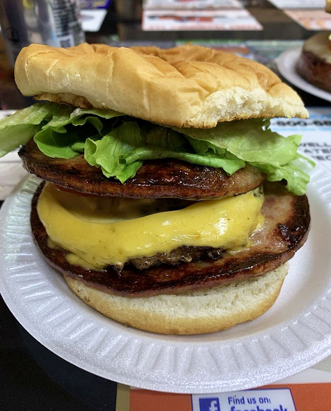 This isn't just a burger, it's an architectural masterpiece of meat, cheese, and pickles that's been perfected over decades.