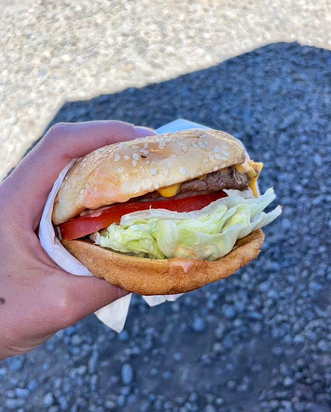 This isn't just a burger &ndash; it's edible nostalgia, complete with the perfect ratio of fresh veggies, melty cheese, and a patty that remembers what beef is supposed to taste like.