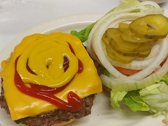 This isn't just a cheeseburger&mdash;it's a work of art. The cheese melts like Salvador Dal&iacute;'s clocks, while pickles and onions stand at attention. 