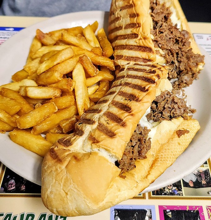 The cheesesteak sandwich&mdash;where golden fries and perfectly grilled beef create the kind of lunch that demands a post-meal nap.