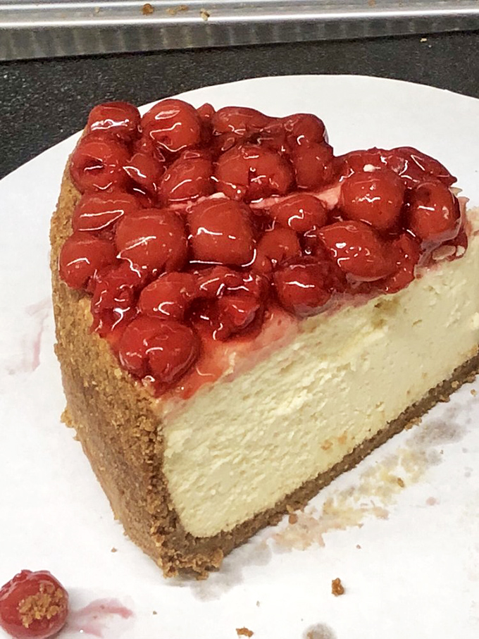 Cherry cheesecake that makes you question all other desserts you've ever loved. That graham cracker crust deserves its own fan club.
