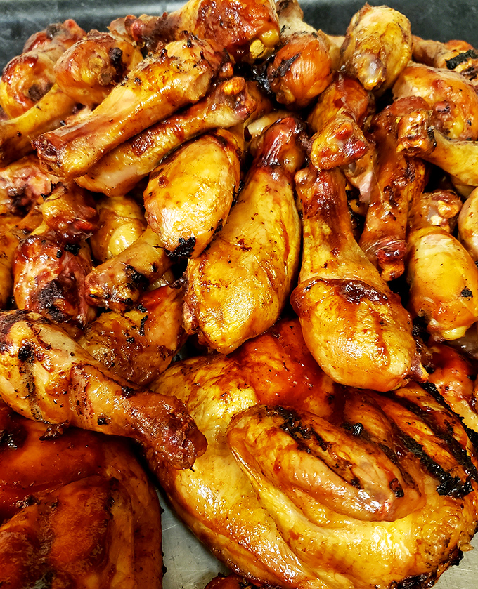 These chicken legs have clearly been working out. Glistening with a mahogany glaze that promises a perfect balance of smoke, spice, and everything nice.