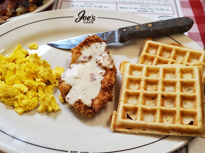 Crispy meets fluffy in this chicken and waffle symphony. The kind of breakfast-meets-lunch that demands you cancel your afternoon plans.
