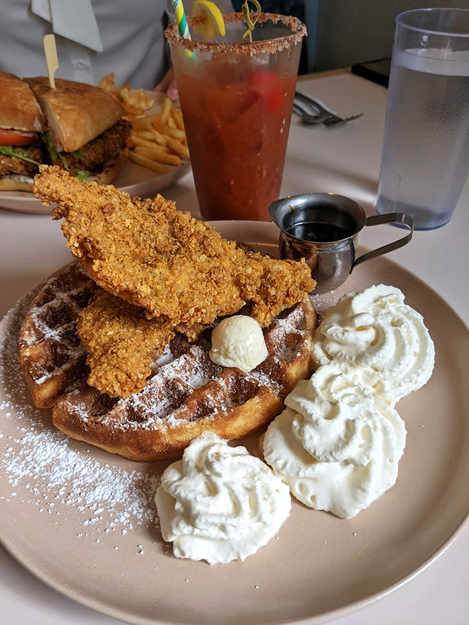 Chicken and waffles: the breakfast-lunch alliance that proves some of history's best partnerships involve maple syrup and perfectly crispy poultry.