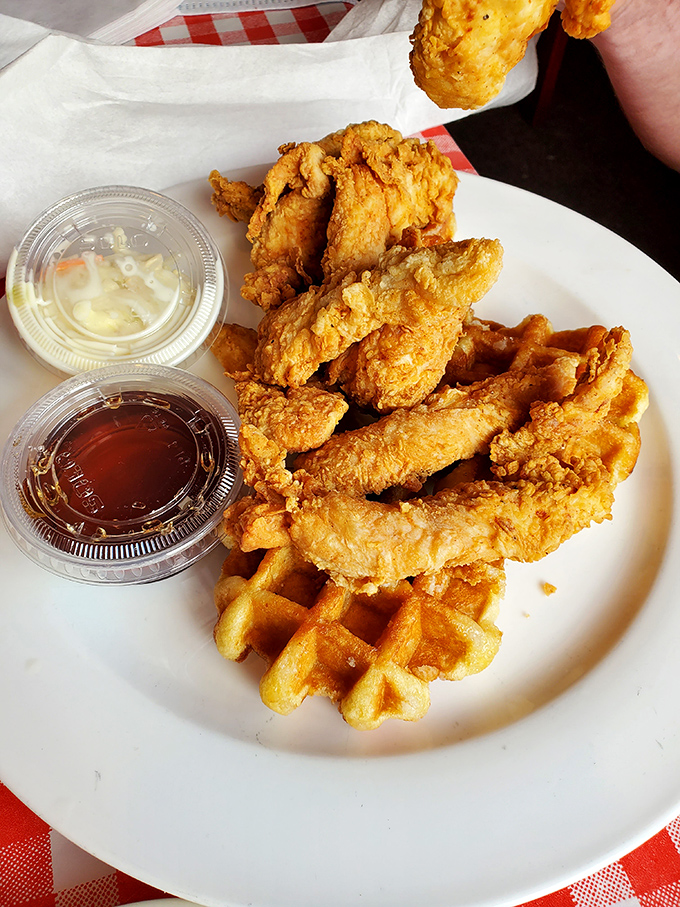 Chicken tenders and waffles &ndash; proof that breakfast and dinner can coexist in perfect harmony. The green beans provide the illusion of healthfulness.