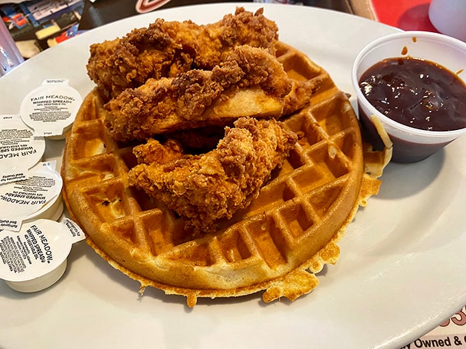 When fried chicken meets waffle, magic happens—add syrup and you've got breakfast nirvana on a plate.