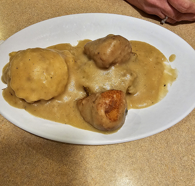 Chicken croquettes swimming in gravy&mdash;the kind of dish your grandmother would approve of, especially if your grandmother was a culinary genius.