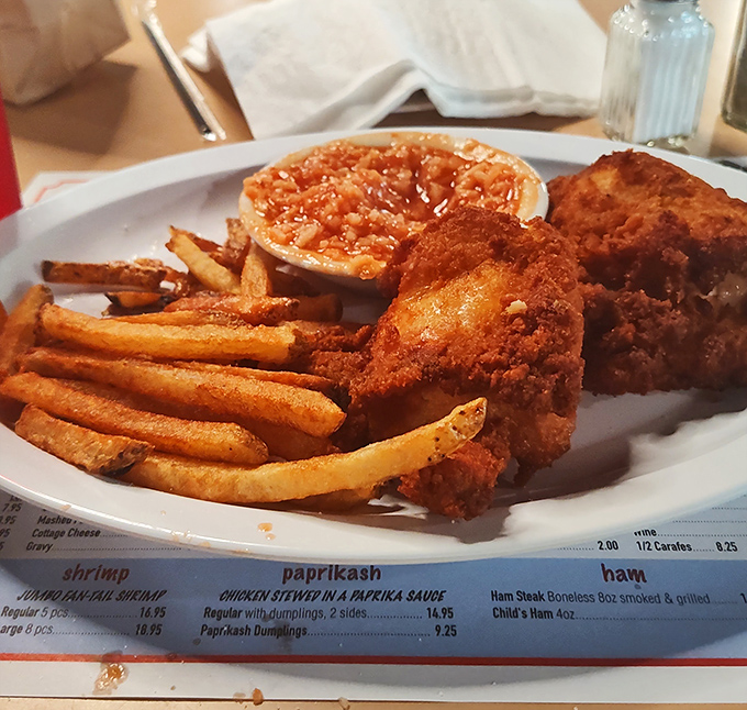 A dinner plate that looks like Sunday supper at grandma's, if grandma was a fried chicken genius.