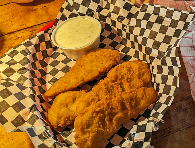 Golden-brown chicken fingers that make you question why you ever grew up. These crispy beauties might just be worth crossing state lines for.
