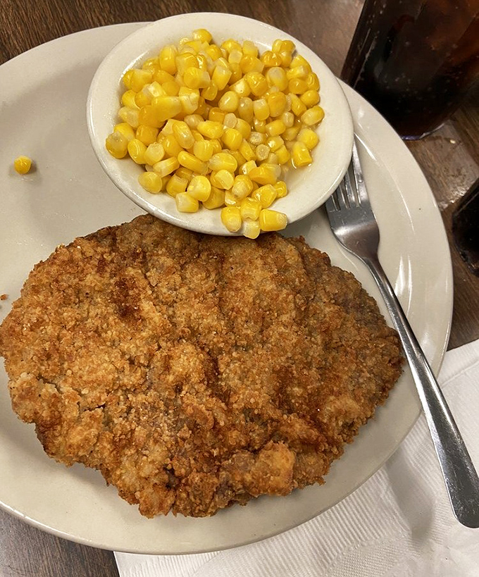 This chicken fried steak with buttery corn isn't just dinner—it's edible therapy after a long day when nothing else will fix what ails you.
