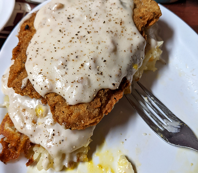 Not all heroes wear capes—some wear crispy breading and come smothered in country gravy. This chicken fried steak is comfort food engineering at its finest.