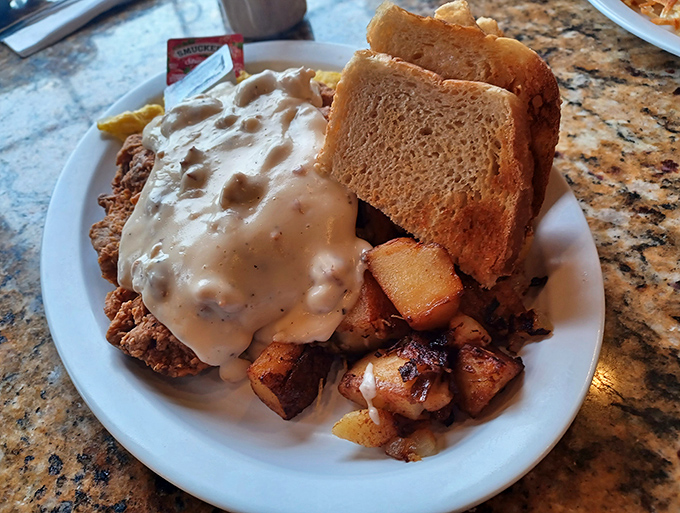 Country-fried steak: where meat meets breading in a marriage blessed by gravy. Comfort food that hugs your insides like a warm blanket.