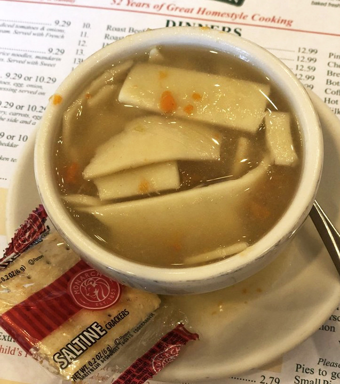 Wide noodles swimming in golden broth with the confidence of Olympic athletes—this soup doesn't need fancy ingredients to win gold.