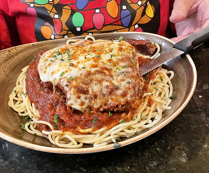 Chicken Parmesan that could unite warring nations. That melted cheese pull would make even the most dignified diner contemplate inappropriate noises.