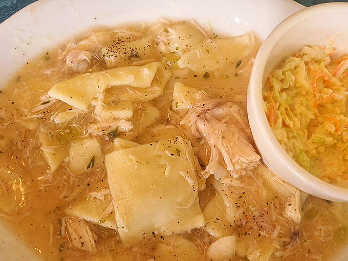 Behold the legendary chicken pot pie &ndash; square noodles swimming in golden broth with tender chicken. This isn't just soup; it's Pennsylvania Dutch soul in a bowl.