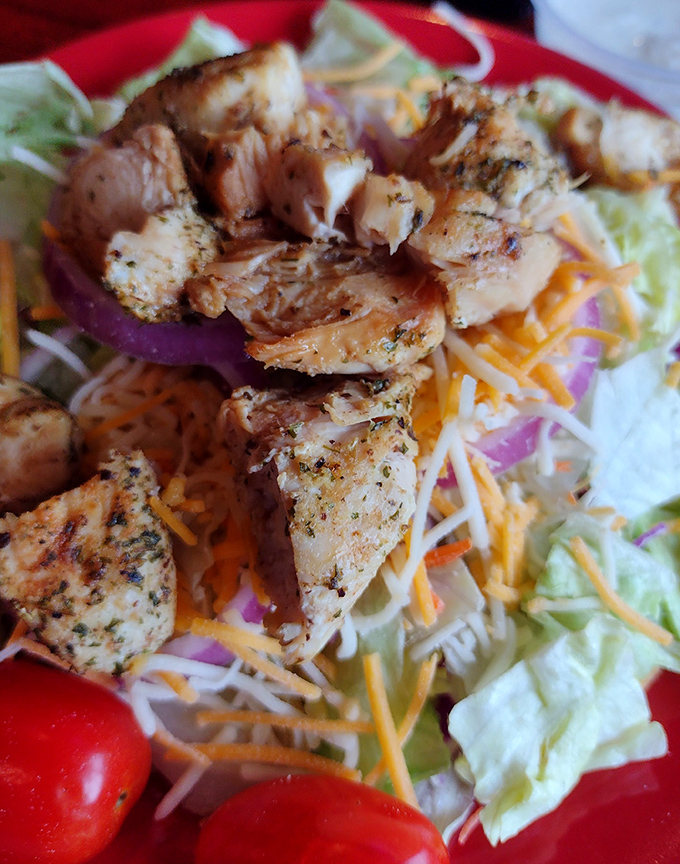 This isn't just a salad&mdash;it's a protein-packed flavor festival where grilled chicken gets to show off atop a bed of fresh ingredients. Healthy-ish never looked so tempting.