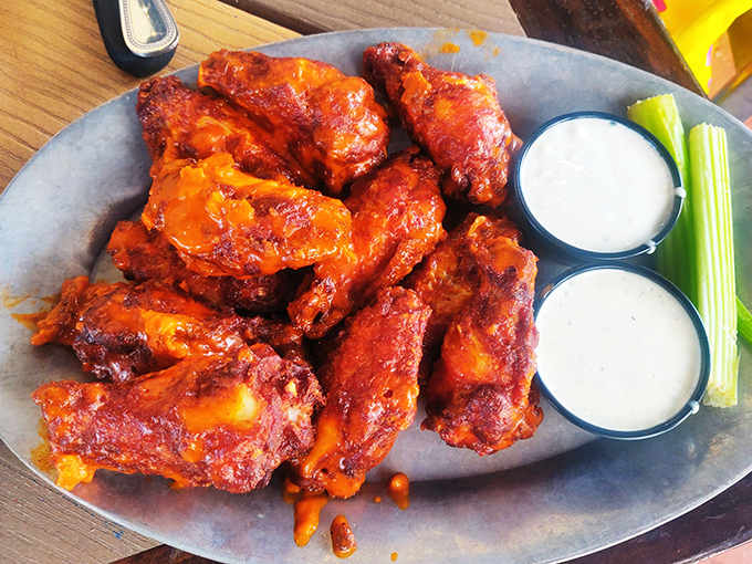 Wings that'll make your taste buds rev their engines. Crispy, saucy, and served with cooling dips&mdash;these aren't your standard pit stop snacks.