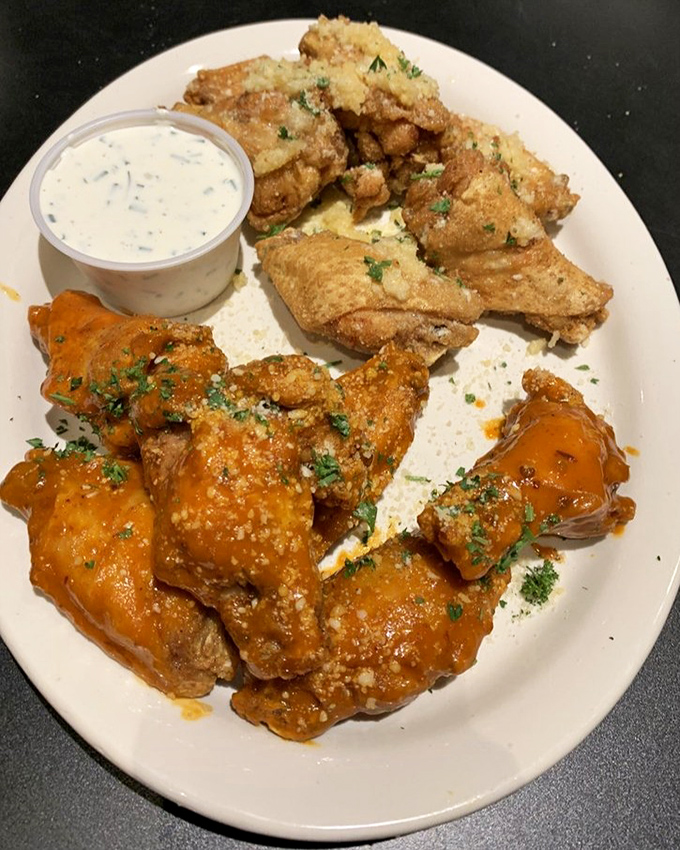A plate of wings that strikes the perfect balance between crispy exterior and juicy interior&mdash;proof that simple food done right is culinary magic.