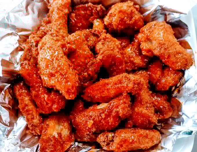 Wings so perfectly sauced they should have their own Instagram account. Crispy, spicy, and absolutely worth the extra napkins.