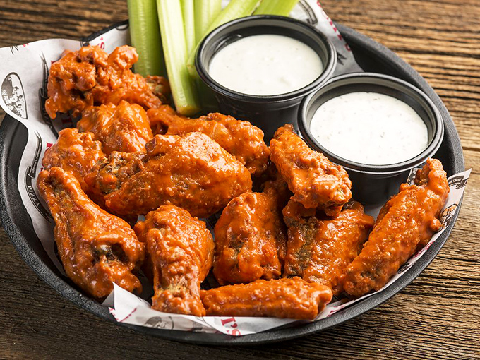 Buffalo wings that don't mess around&mdash;crispy, saucy, and accompanied by cooling dips that know their supporting role.