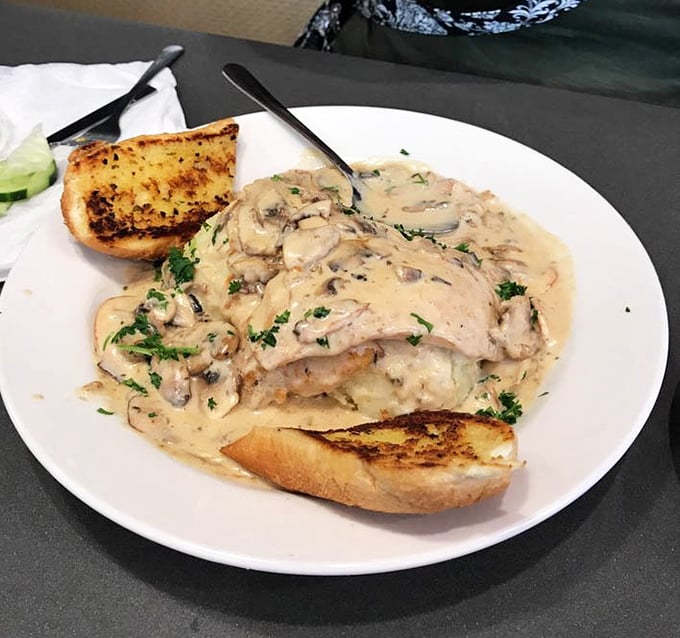 Chicken Marsala that doesn't whisper its flavors but declares them boldly, with mushrooms swimming happily in a sauce worth bottling.