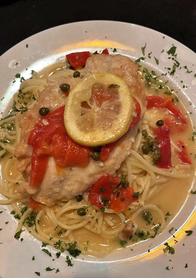The Chicken Piccata performs a perfect balancing act &ndash; tender chicken, bright lemon, briny capers, and sweet peppers dancing together on a bed of pasta.