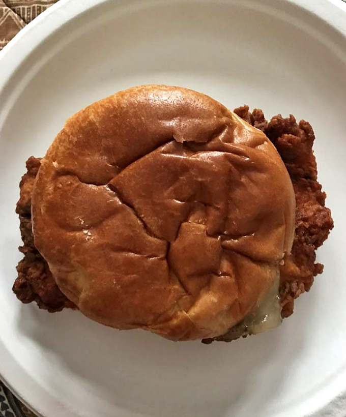This isn't just a chicken sandwich; it's an engineering marvel of crispy coating, pillowy bun, and juicy meat that puts fast food versions to shame.