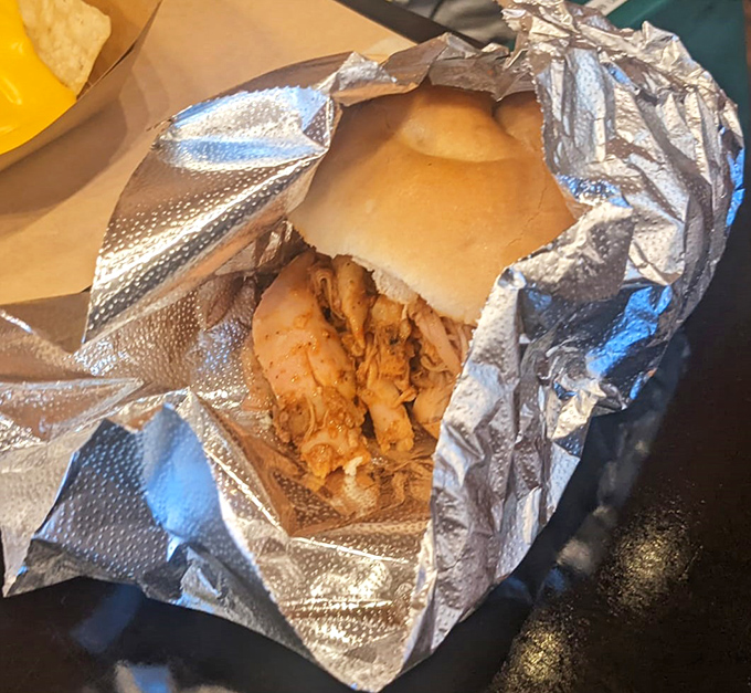 Foil-wrapped chicken sandwich simplicity that belies the complexity within. Like finding out your quiet neighbor secretly won three Grammy awards.