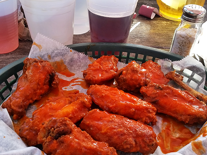 Wings that glow like the Florida sunset, slathered in sauce that demands both napkins and respect. Worth every sticky finger.