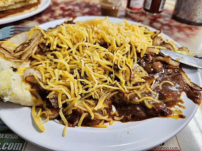 When chili and cheese join forces with eggs, breakfast becomes a delicious rebellion against boring mornings.