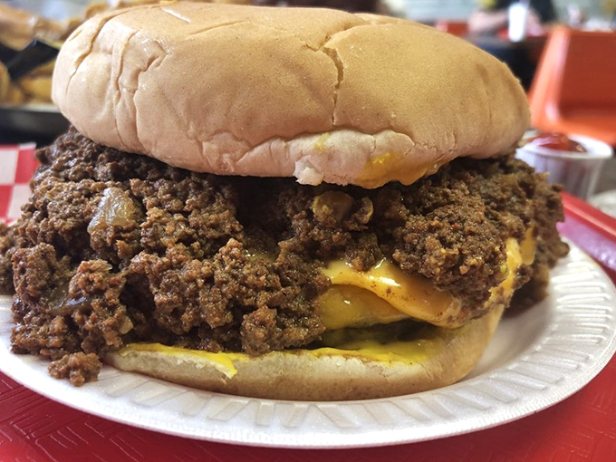 Behold the chili cheeseburger in its natural habitat. Not so much a meal as it is a delicious dare that's worth every napkin.
