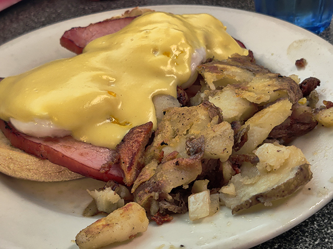 Chipped beef on toast&mdash;what military veterans called by another name&mdash;gets the royal treatment here with creamy gravy blanketing thick-cut ham and crispy potatoes.