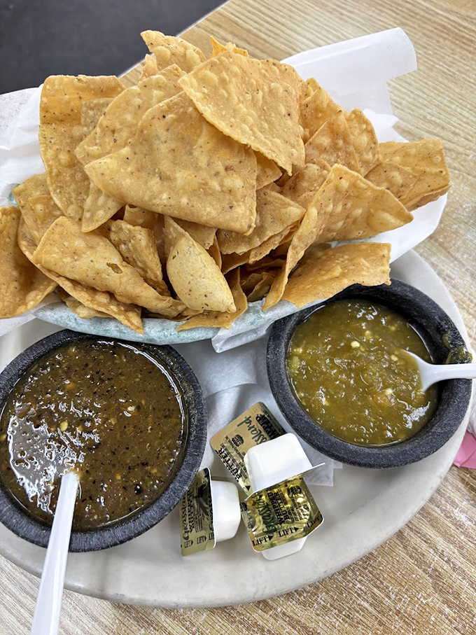 These aren't just chips and salsa—they're crispy vehicles for delivering two distinct salsas, each worthy of its own fan club.