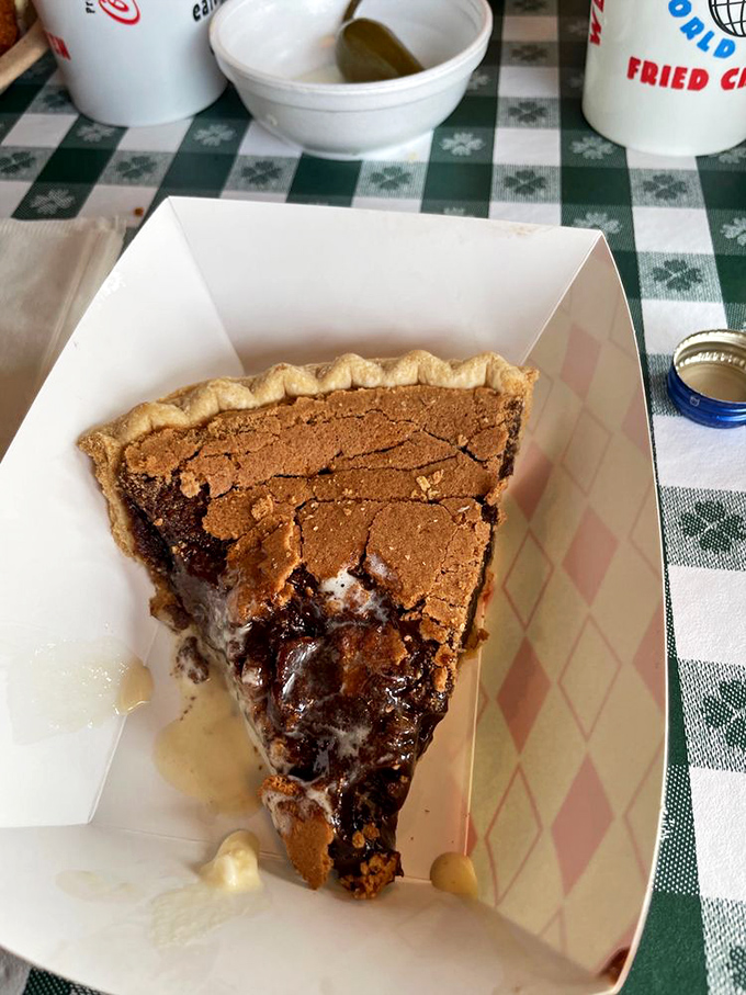 Chocolate chess pie that makes grown adults fight over the last slice. Like a brownie and a custard had a beautiful Southern baby.