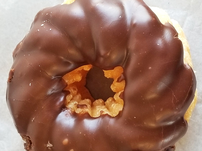 This chocolate cruller is wearing a tuxedo of glaze for your special occasion &ndash; breakfast on a Tuesday counts as special, right?
