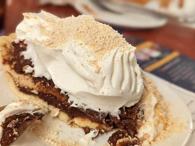 Layer upon heavenly layer of chocolate and peanut butter cream topped with clouds of whipped cream&mdash;this pie doesn't just satisfy cravings, it creates lifelong memories.