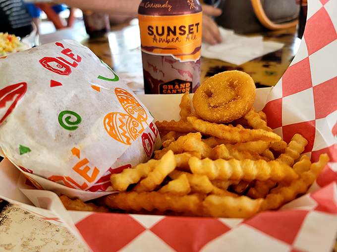 Sunset Amber meets crispy perfection. Those fries with the smiling potato face remind you that food should be fun, especially on the Mother Road.
