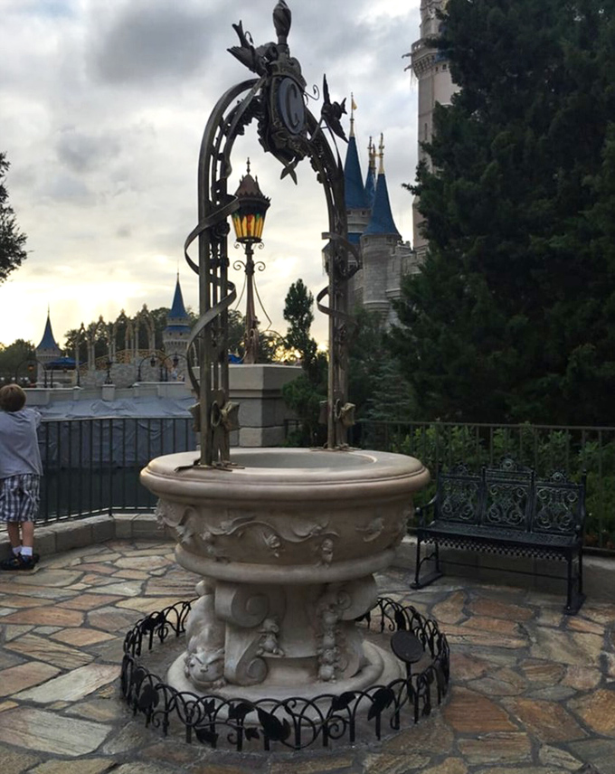 This enchanted wishing well sits in the castle's shadow, collecting dreams and loose change with equal enthusiasm.