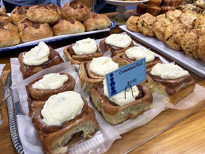 Cinnamon rolls wearing cream cheese frosting like a crown. Royalty of the pastry case that demands your immediate attention.