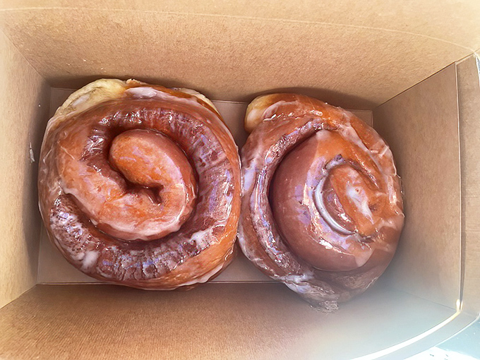 Spiral-shaped proof that geometry can be delicious. These cinnamon rolls aren't just pastries&mdash;they're sweet, sticky monuments to morning indulgence.