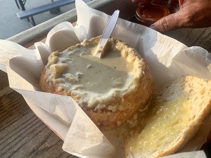 The bread bowl isn't just a vessel; it's your edible insurance policy against missing a single drop of that creamy clam chowder.