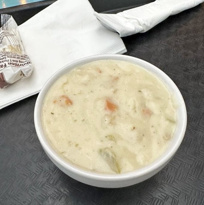 Clam chowder that doesn't hide behind excessive cream or potato. You can actually taste the briny sweetness of the sea in each spoonful.