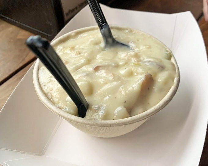 This isn't just clam chowder; it's a creamy bowl of New England nostalgia that somehow tastes even better in the Florida sunshine.