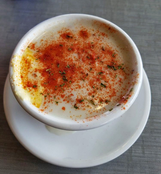This isn't just chowder; it's a creamy canvas of comfort with a paprika sunset dusting the surface. Poetry in a bowl.