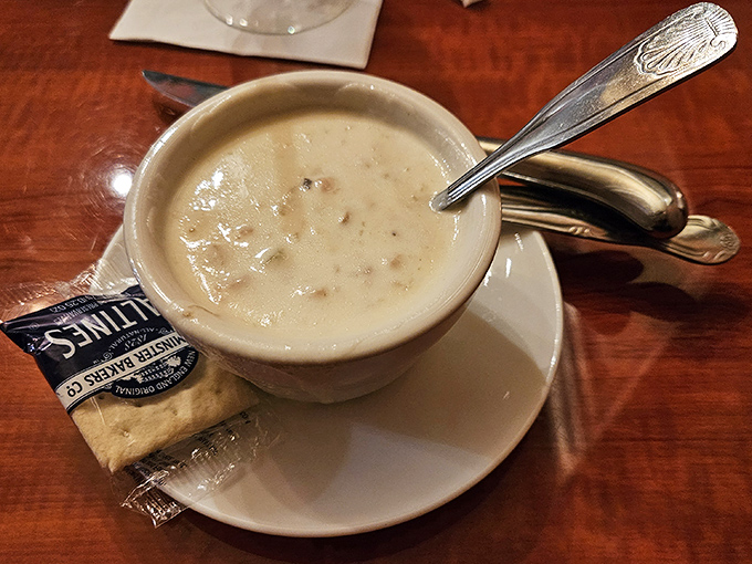 This isn't just clam chowder&mdash;it's a creamy bowl of New England vacation memories, served with oyster crackers for that authentic maritime experience.